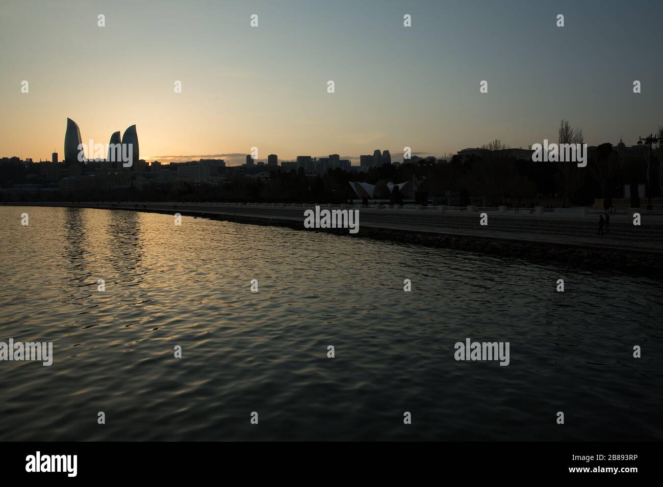 Night view of Baku and the seaside of the Caspian sea. Sunset in Baku ...