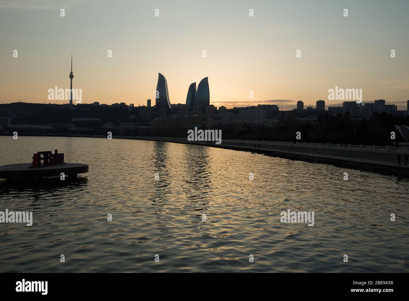 Night view of Baku and the seaside of the Caspian sea. Sunset in Baku ...
