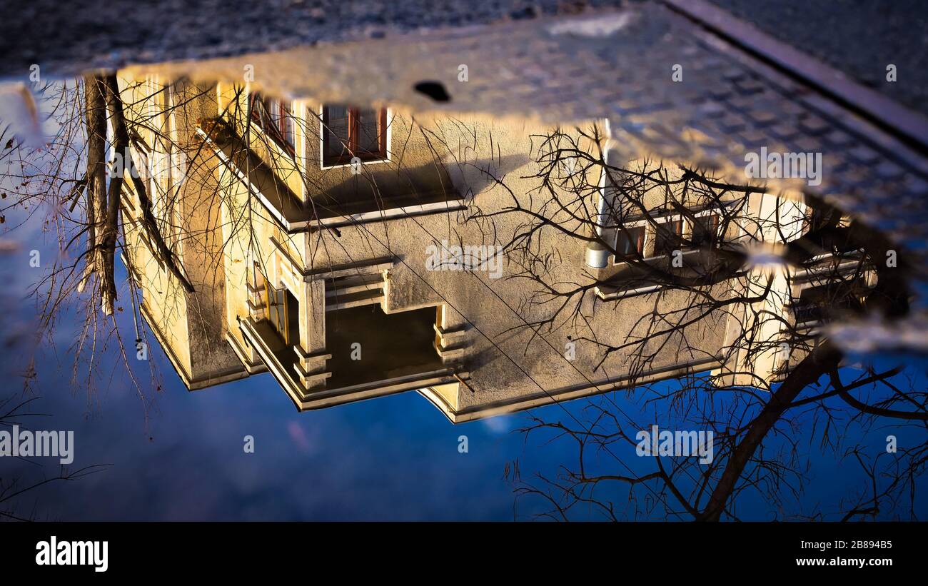 Reflections in puddles hi-res stock photography and images - Alamy