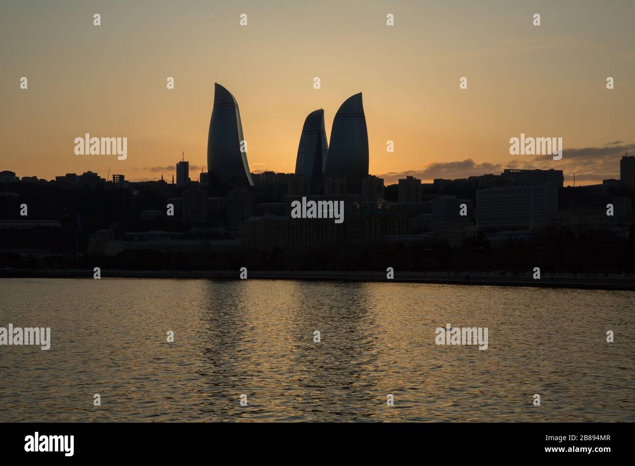 Night view of Baku and the seaside of the Caspian sea. Sunset in Baku ...