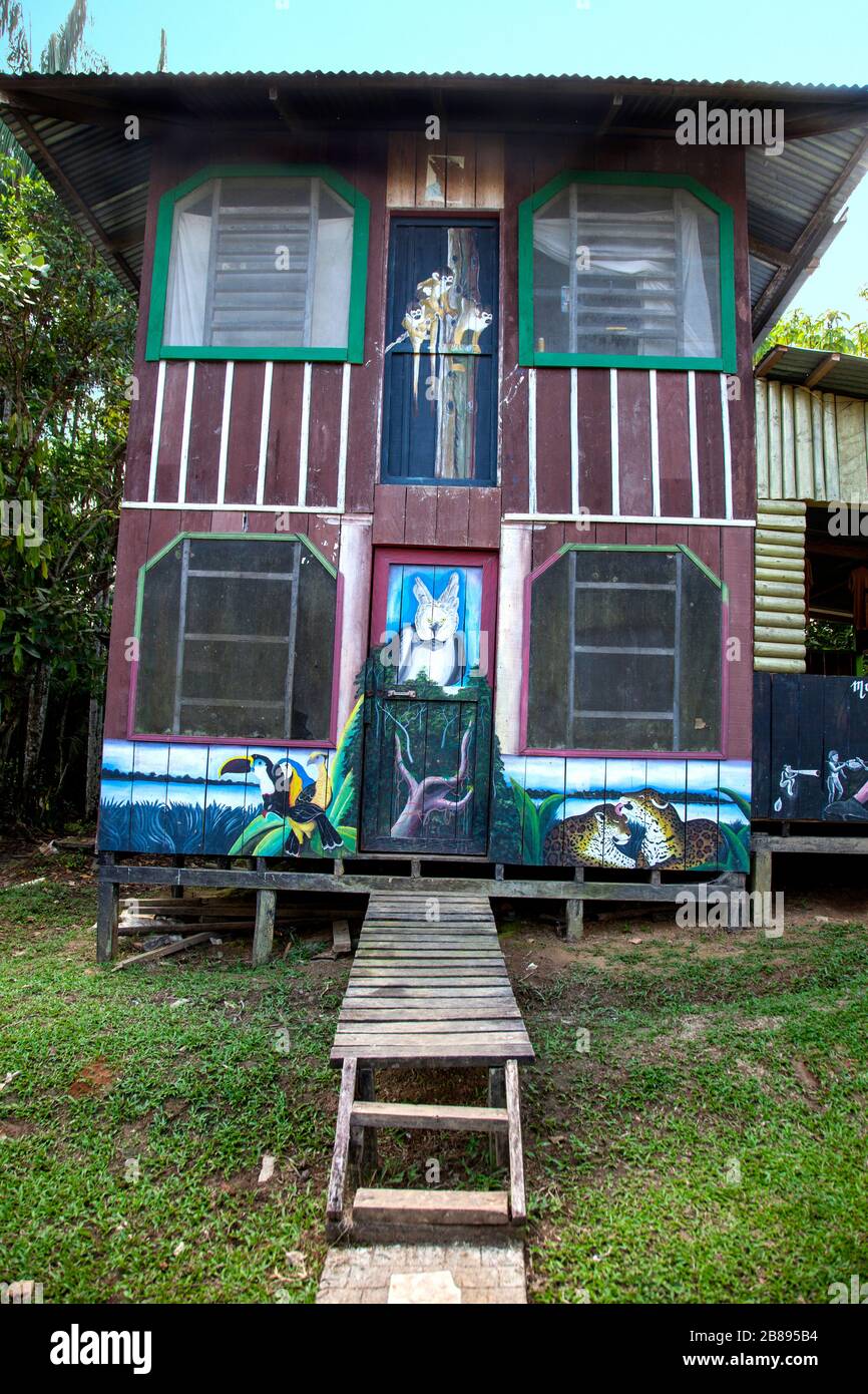 Exotic paintings on Indian houses of the Ticuna tribe community ...