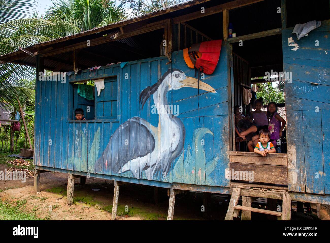 Exotic paintings on houses of the Ticuna tribe community, Mocagua ...