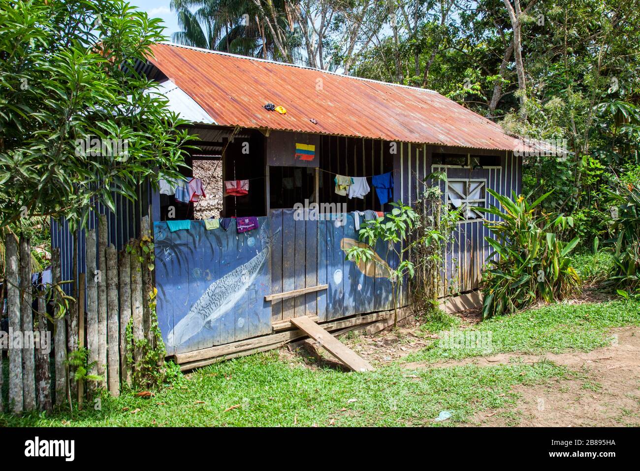 Exotic paintings on houses of the Ticuna tribe community, Mocagua ...