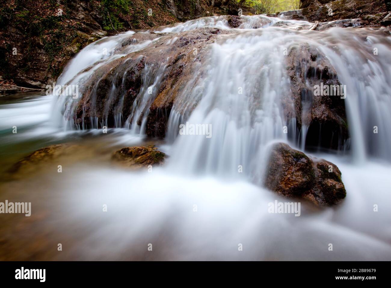 Mesmerizing picturesque waterfall from a mountain river and pouring ...