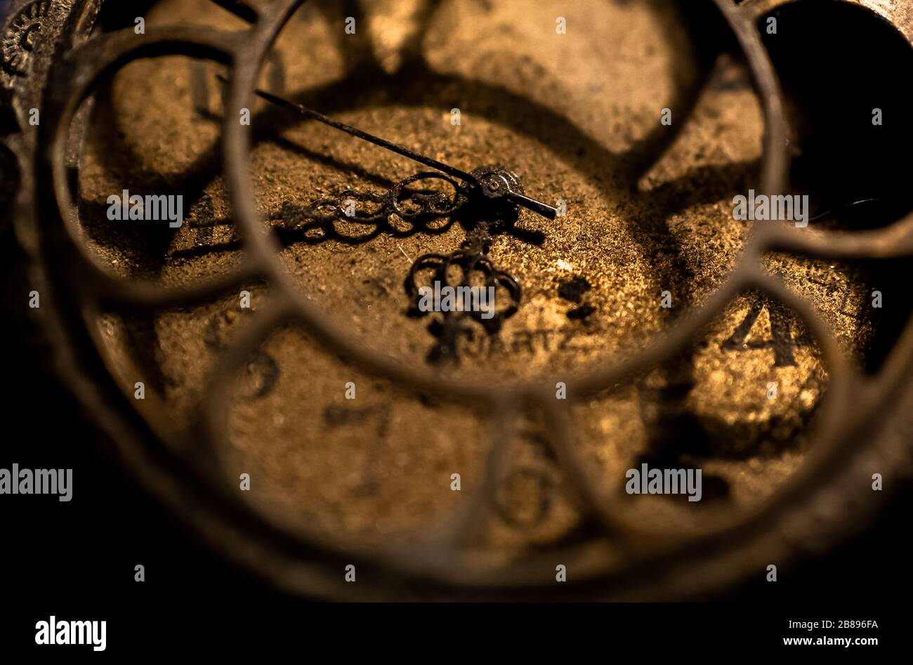 An old and dusty clock mechanism, a broken and lost time, a passing ...