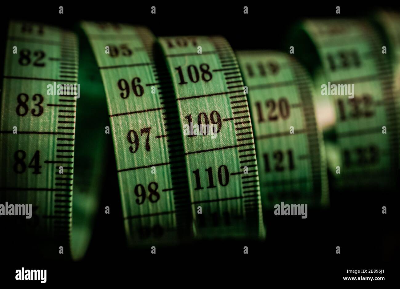 A swirled green tailoring meter use as a tool or instrument for ...