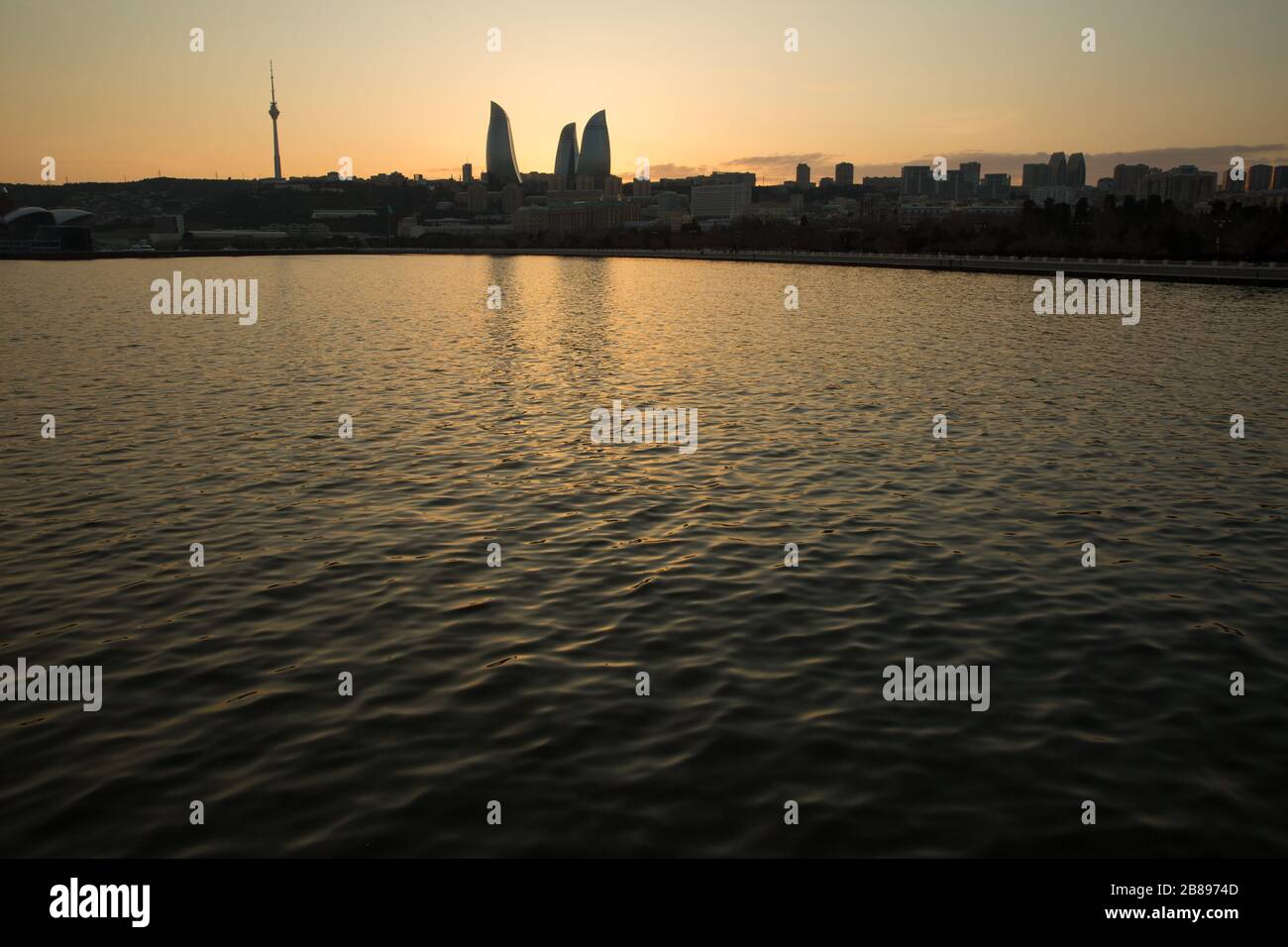 Night view of Baku and the seaside of the Caspian sea. Sunset in Baku ...