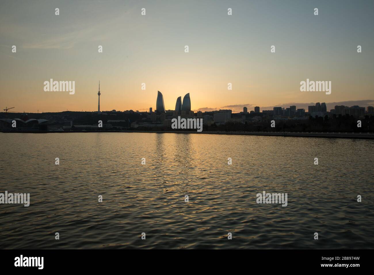 Night view of Baku and the seaside of the Caspian sea. Sunset in Baku ...