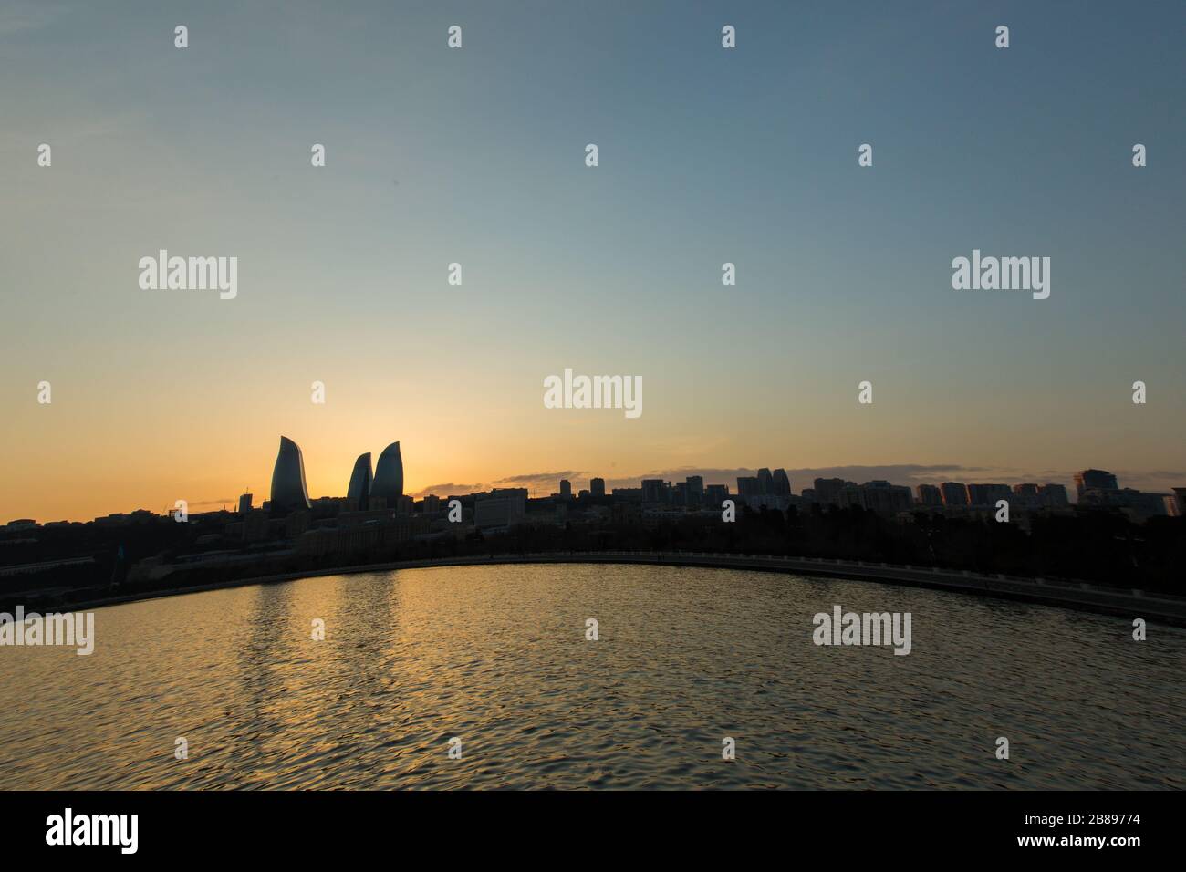 Night view of Baku and the seaside of the Caspian sea. Sunset in Baku ...