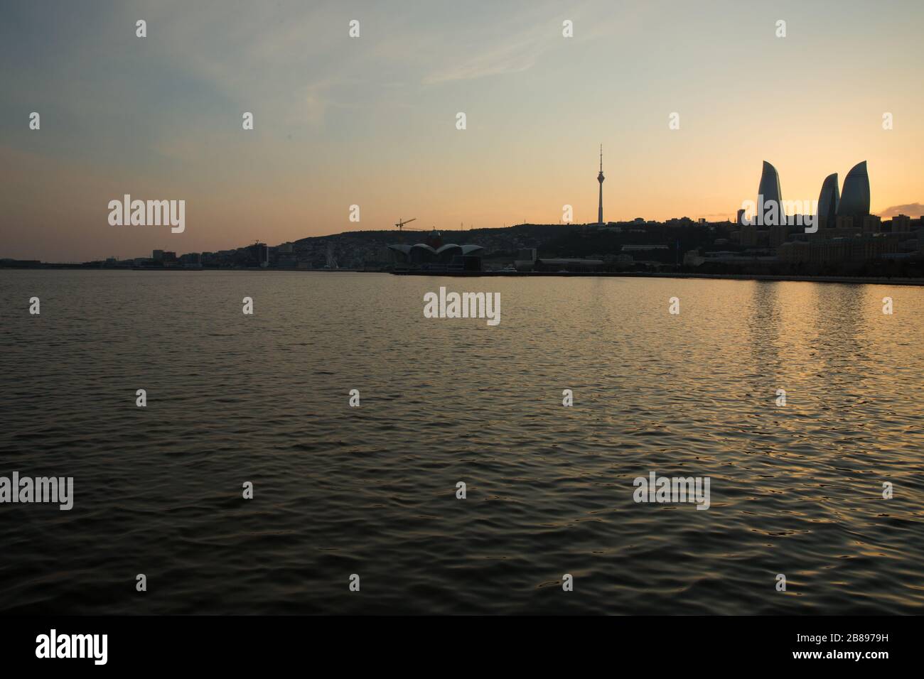 Night view of Baku and the seaside of the Caspian sea. Sunset in Baku ...