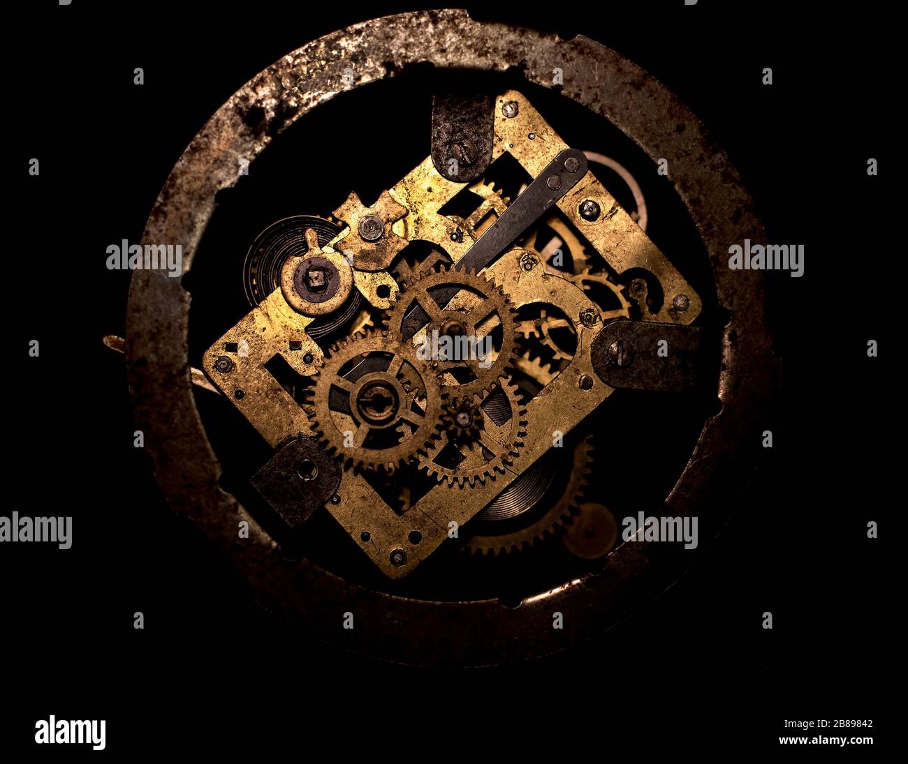 An old and dusty clock mechanism, a broken and lost time, a passing ...