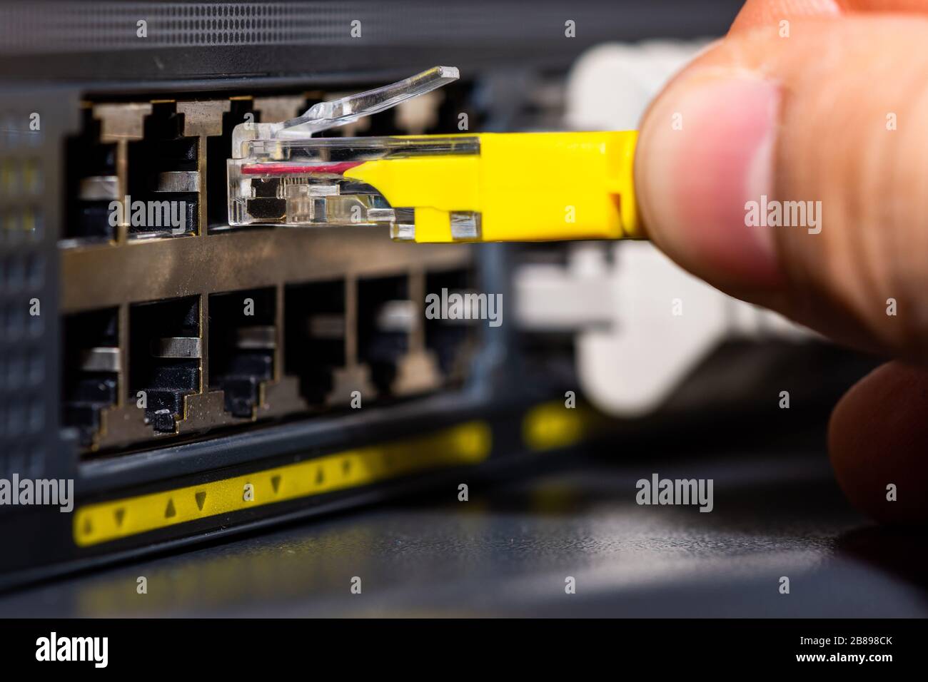 Ethernet cables connected to the Network Switch in office Stock Photo ...