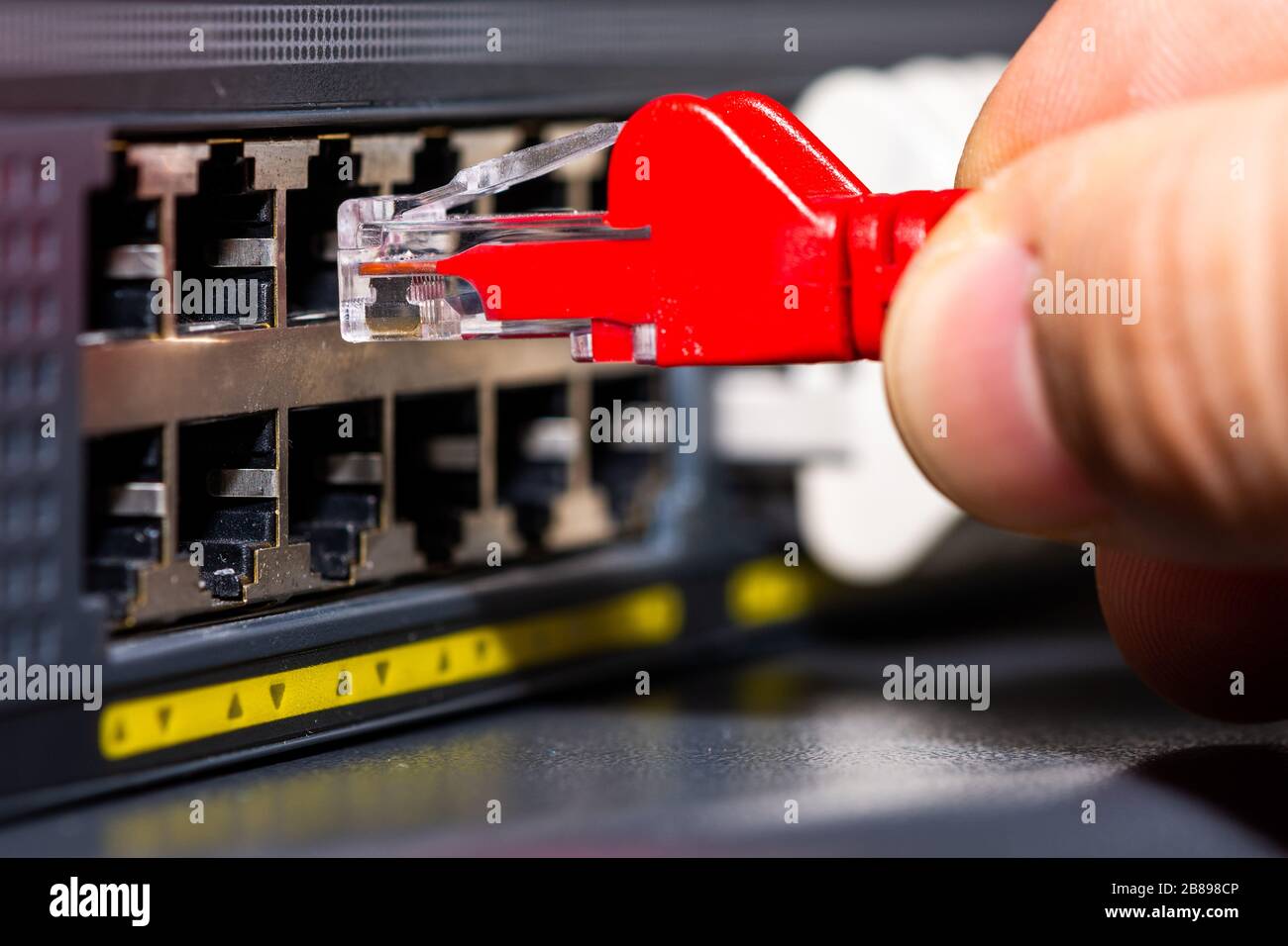 Ethernet cables connected to the Network Switch in office Stock Photo ...