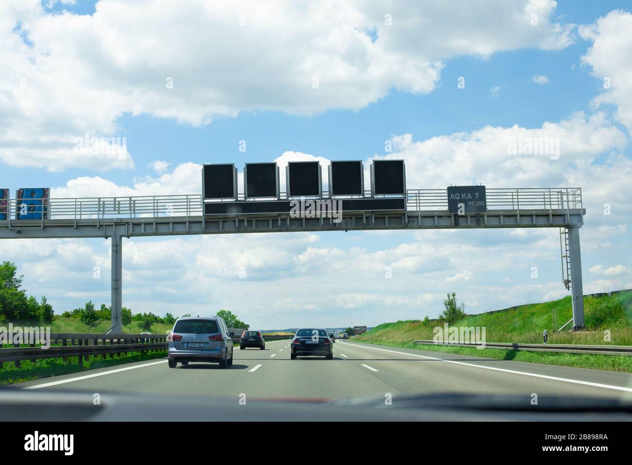 Driving on a highway, picture made from the car, view to the traffic ...
