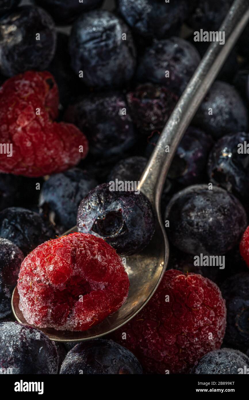 Frozen raspberries on dark hi-res stock photography and images - Alamy