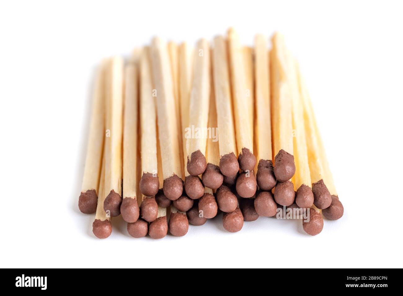 Wooden matches with sulfur for lighting a fire isolated on a white ...