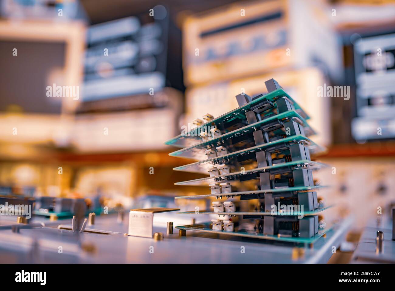 Microchips are stacked on top of each other on metal plates in the ...