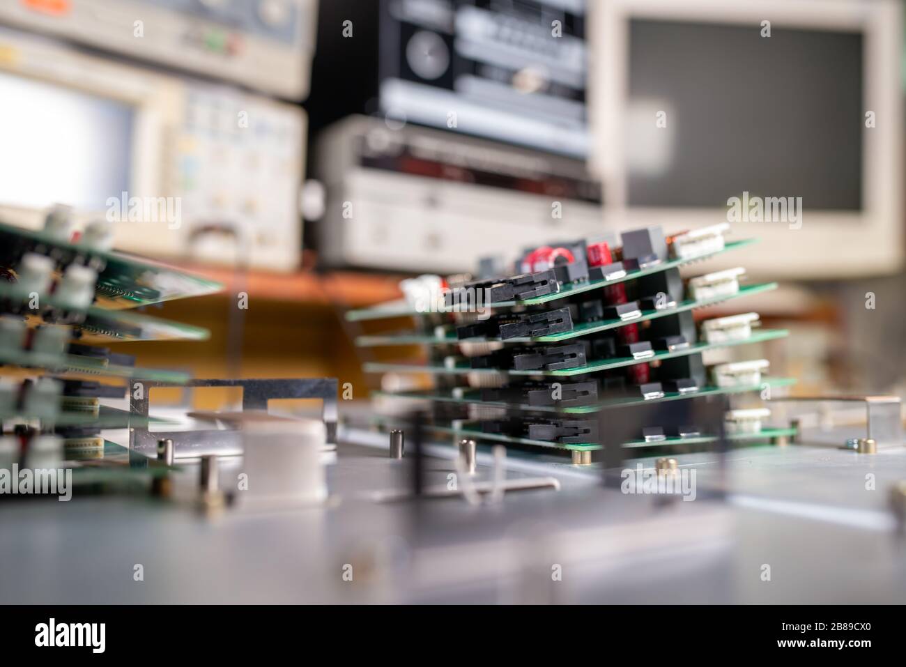Microchips are stacked on top of each other on metal plates in the ...