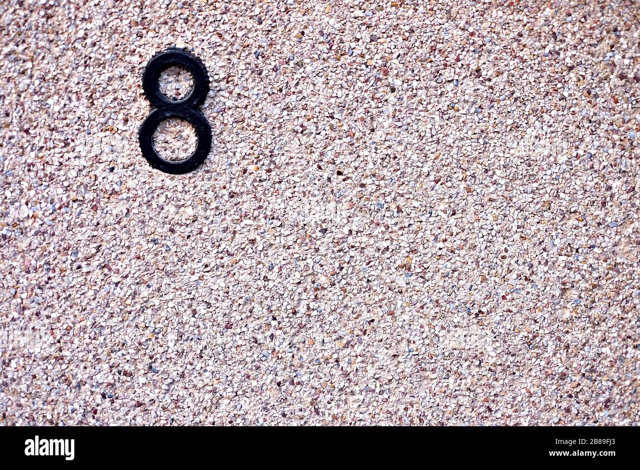 Number 8 / eight, black digit offset on gray rough surface Stock Photo ...