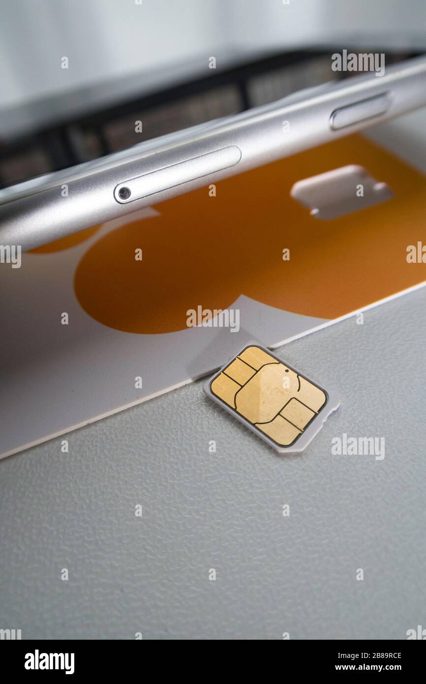 Close up orange sim card hi-res stock photography and images - Alamy