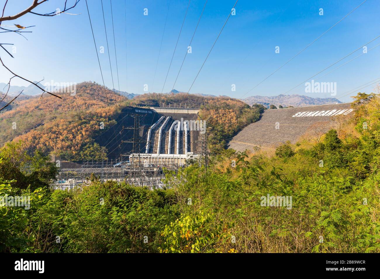 Srinakarin Dam the power station with large mountains and many trees at ...