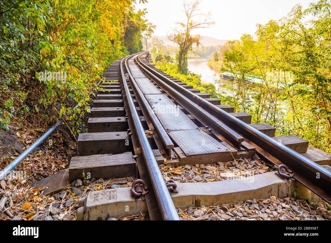 The Death Railway crossing kwai river with Krasae Cave in Kanchanaburi ...