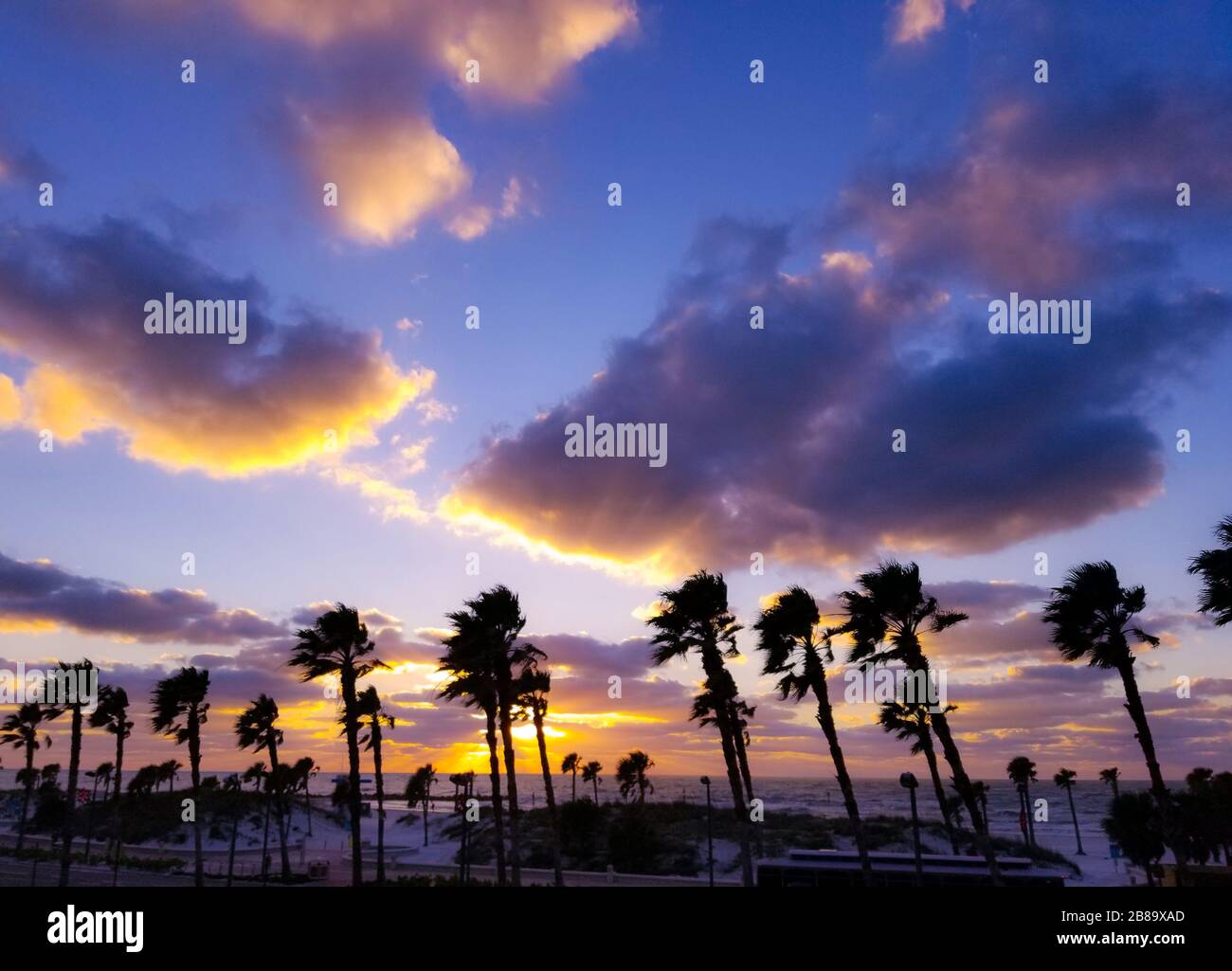 A colorful sunset on Clearwater Beach Stock Photo - Alamy