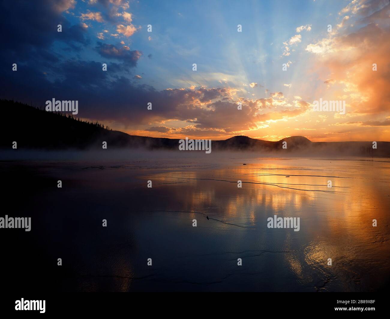 sunset at grand prismatic springs in Yellowstone National Park Stock ...