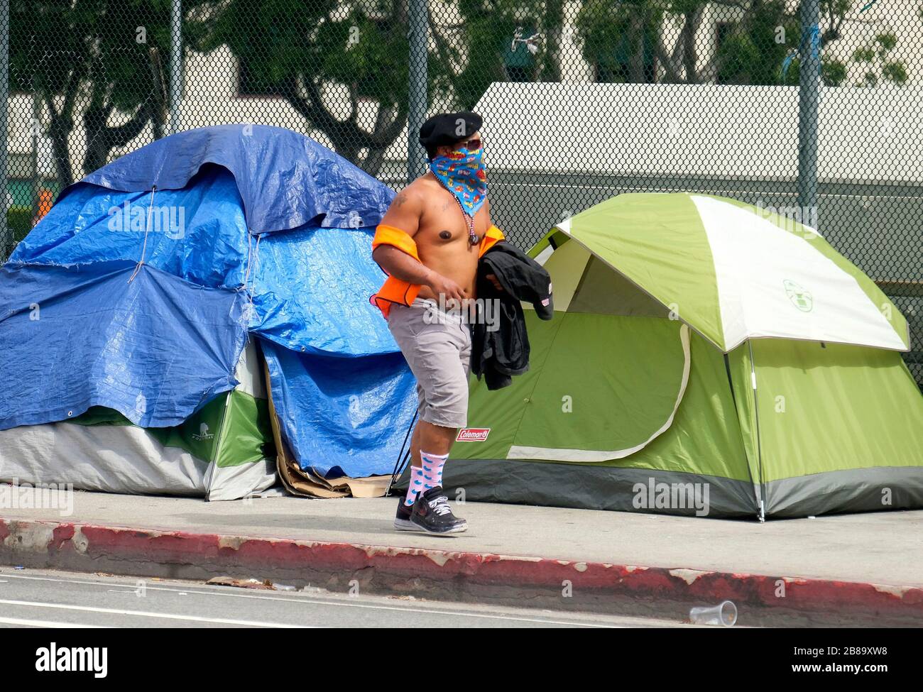 Los Angeles, California, USA. 20th Mar, 2020. A man wearing a bandana ...
