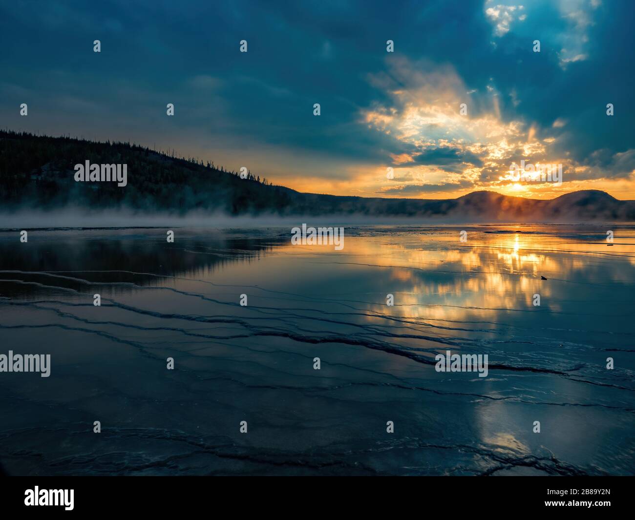 sunset at grand prismatic springs in Yellowstone National Park Stock ...