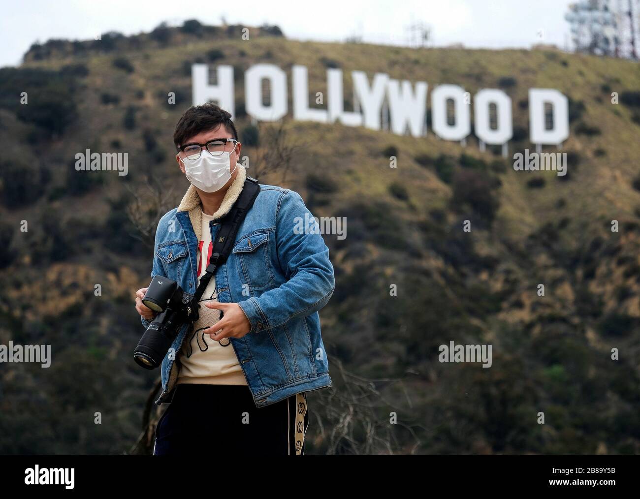 Los Angeles, California, USA. 20th Mar, 2020. Kelvin Ma wearing a face ...