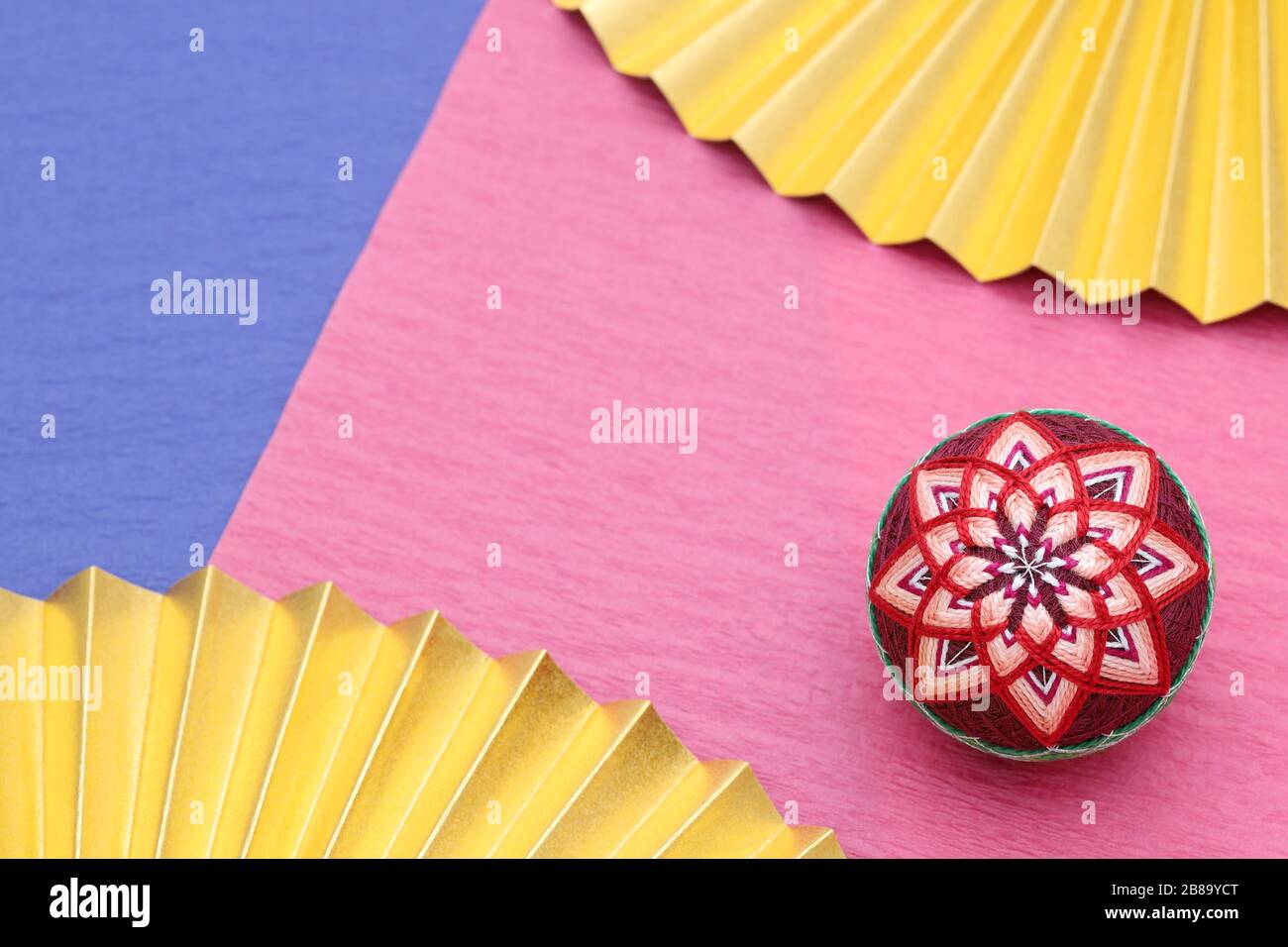 Japanese traditional colorful temari ball with golden folding fan Stock ...