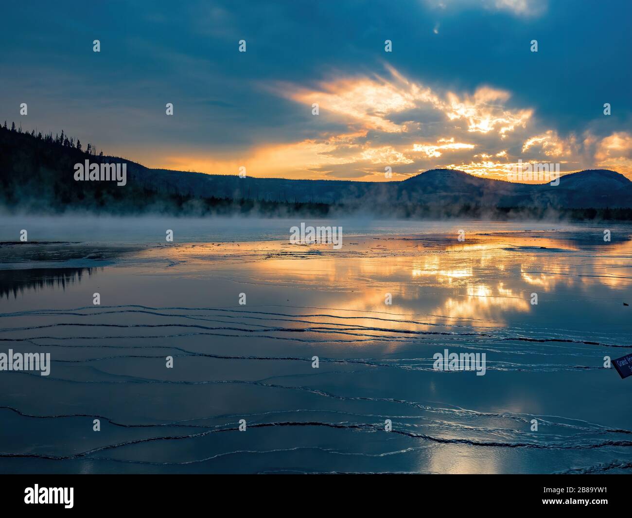sunset at grand prismatic springs in Yellowstone National Park Stock ...