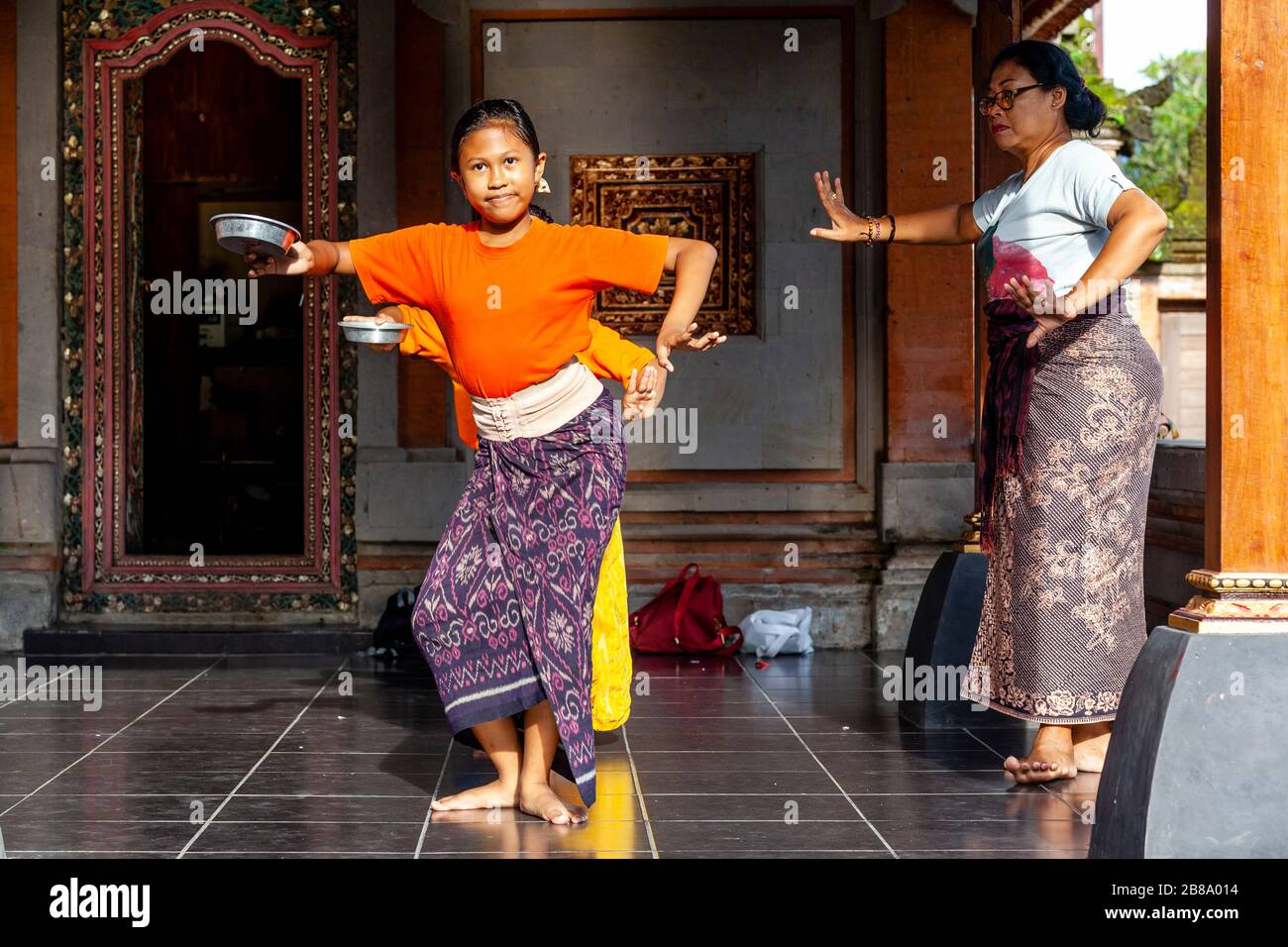 Young Balinese Girls Being Taught Traditional Dance At The Ubud Palace ...