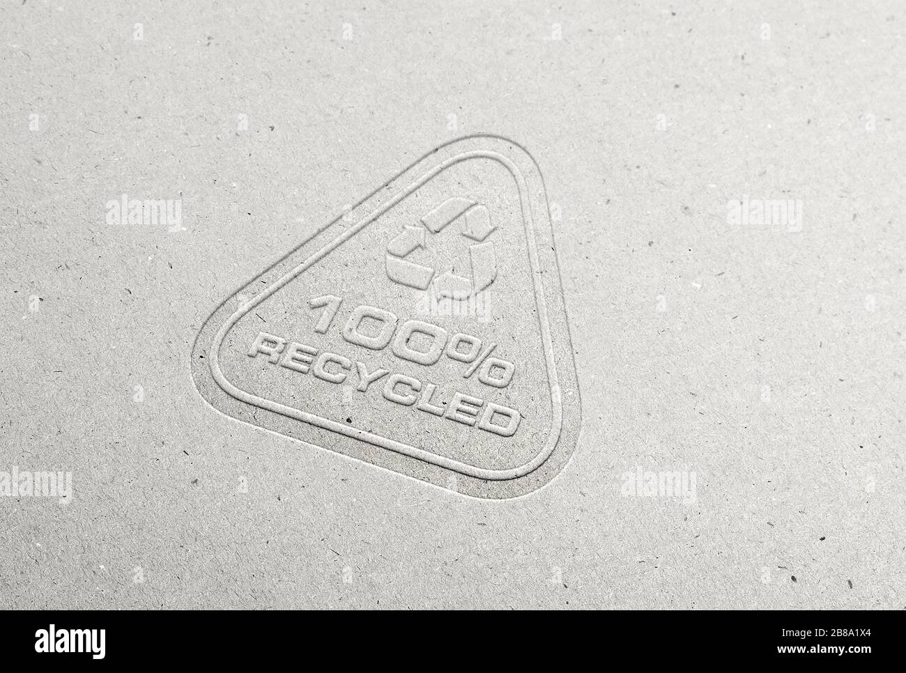 Recycle logo letterpressed on recycled paper background Stock Photo - Alamy