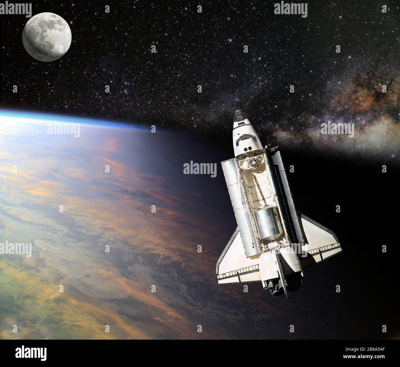 Space Shuttle orbiting the earth. Elements of this image furnished by ...