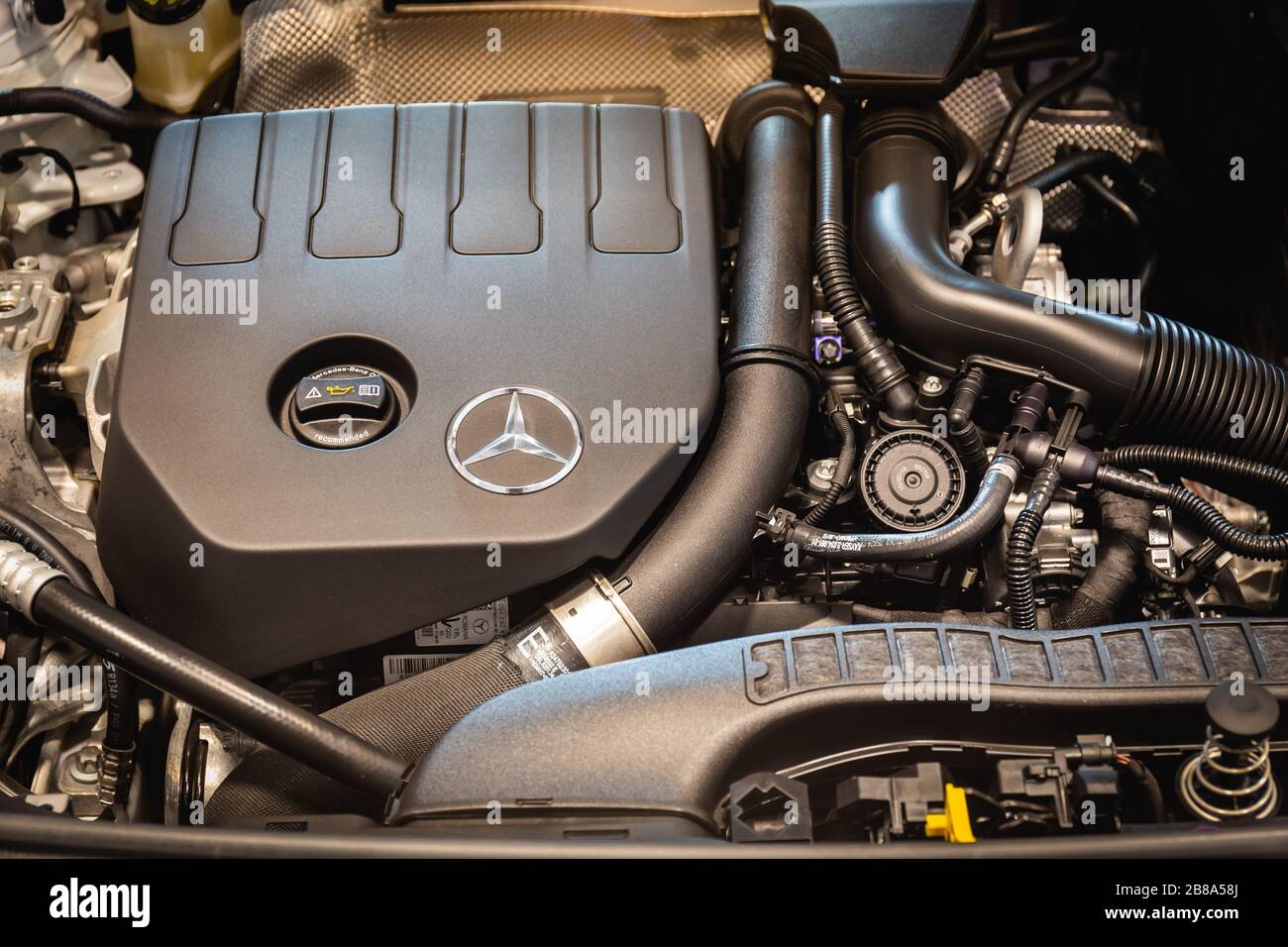 Closeup of The machines of modern cars use a hybrid system that can be ...