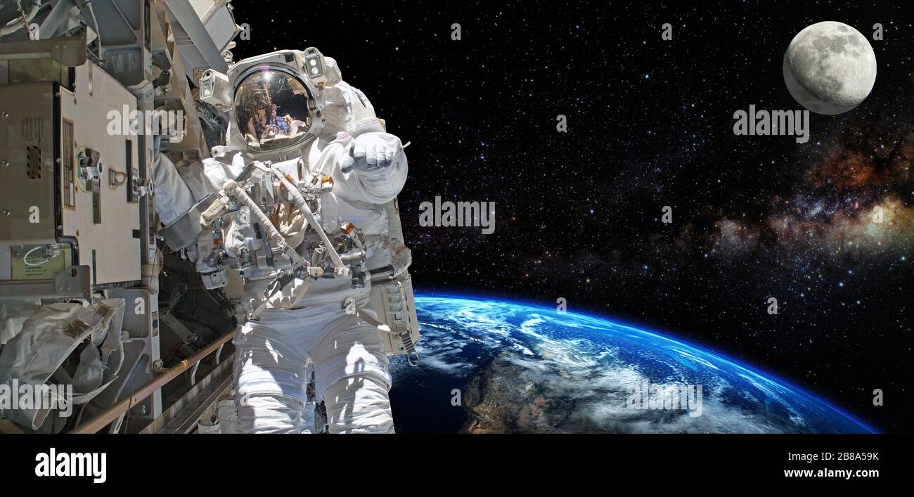 Astronaut on space mission with earth on the background. Elements of ...