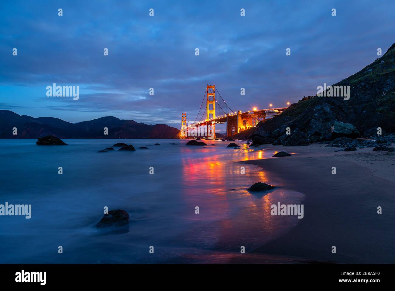The Golden Gate Bridge and Marshall's Beach at Dawn Stock Photo - Alamy