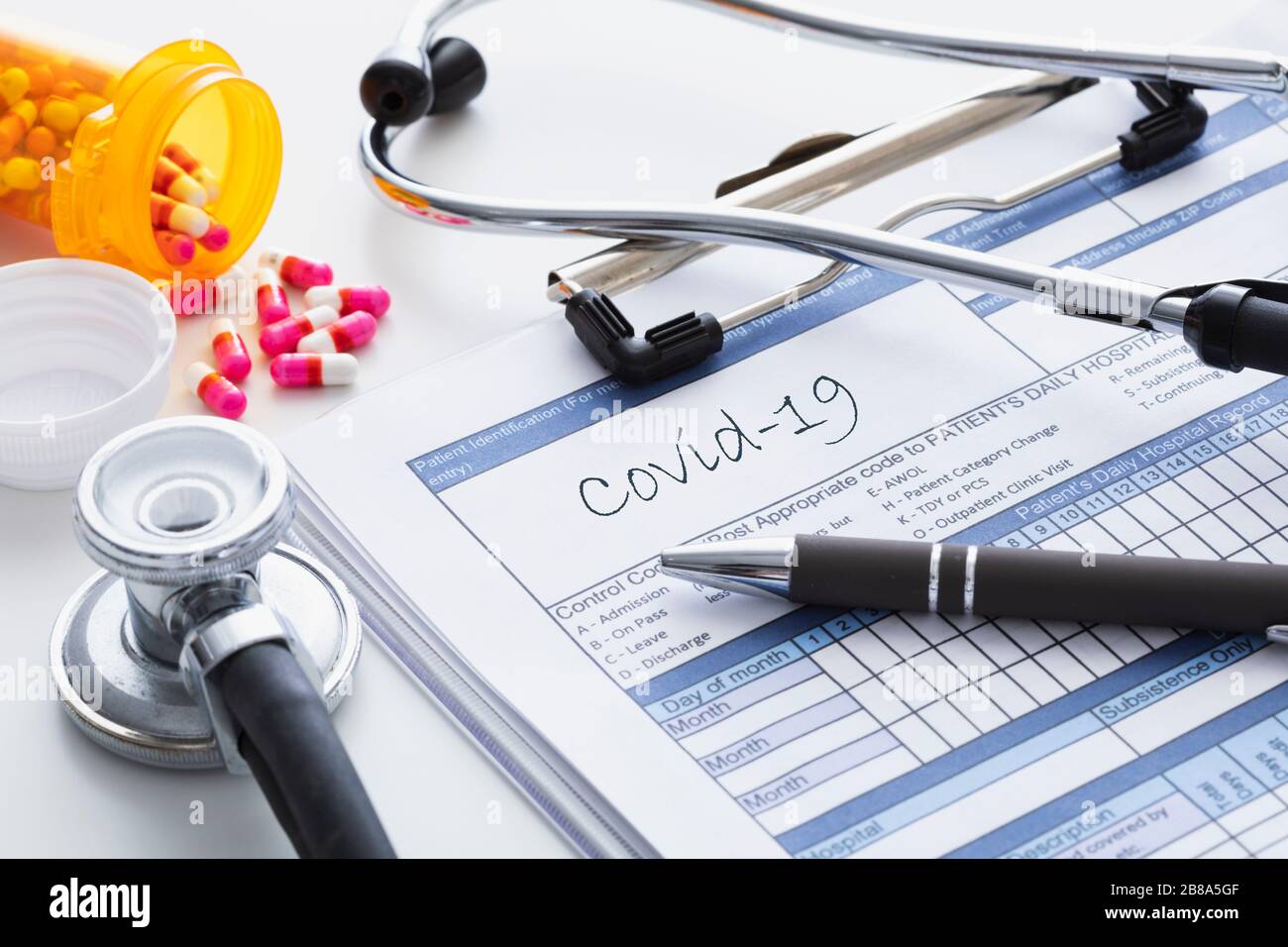 covid19 patient medical paperwork with medical supplies Stock Photo - Alamy