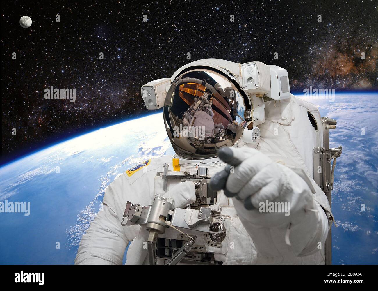 Astronaut on space mission with earth on the background. Elements of ...