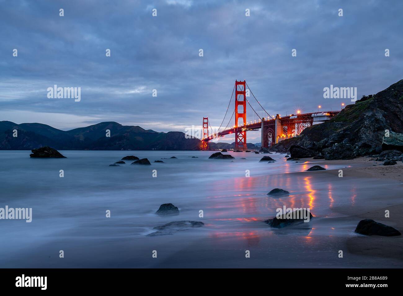 The Golden Gate Bridge and Marshall's Beach at Dawn Stock Photo - Alamy