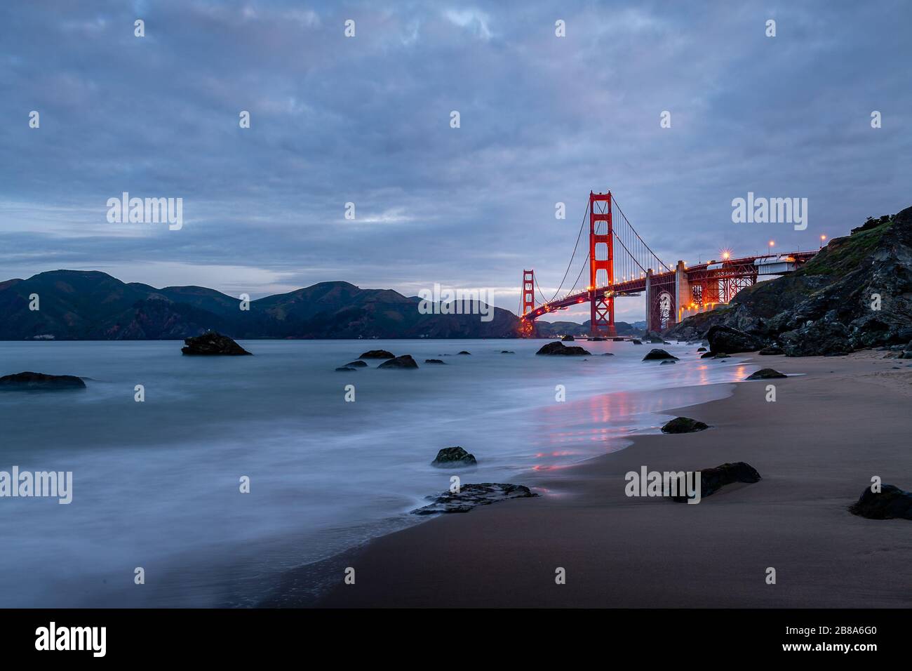 The Golden Gate Bridge and Marshall's Beach at Dawn Stock Photo - Alamy