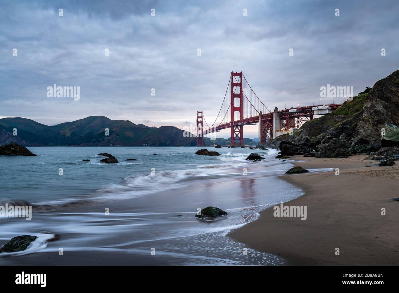 The Golden Gate Bridge and Marshall's Beach at Dawn Stock Photo - Alamy