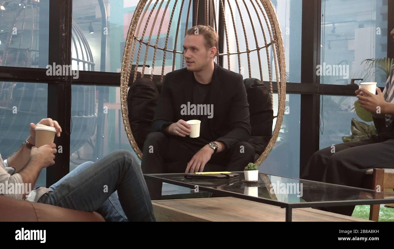 Office worker relax at coffee corner while taking a short break from ...