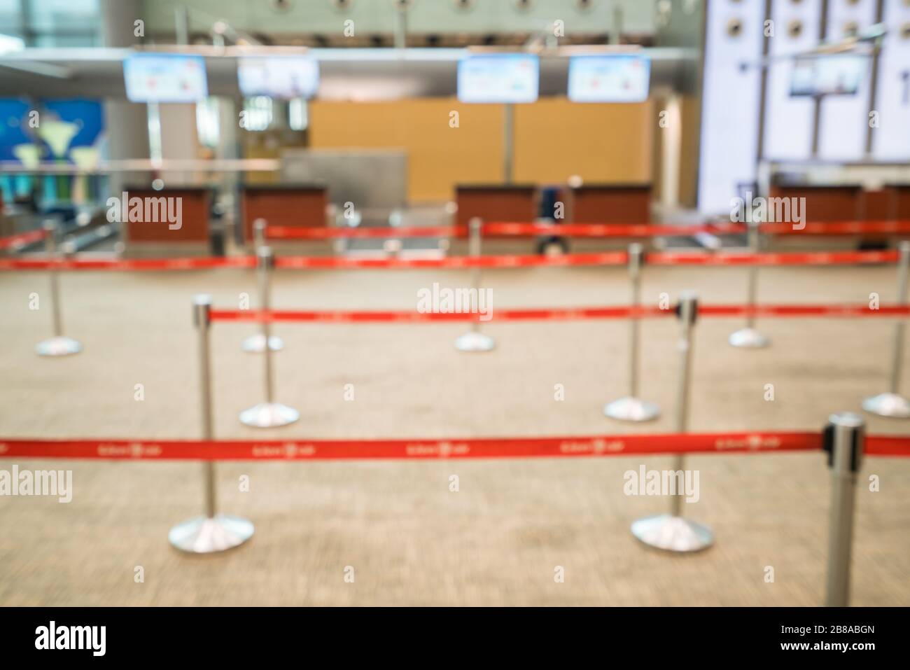Airport check-in desk blurred background defocused. Empty check-in ...