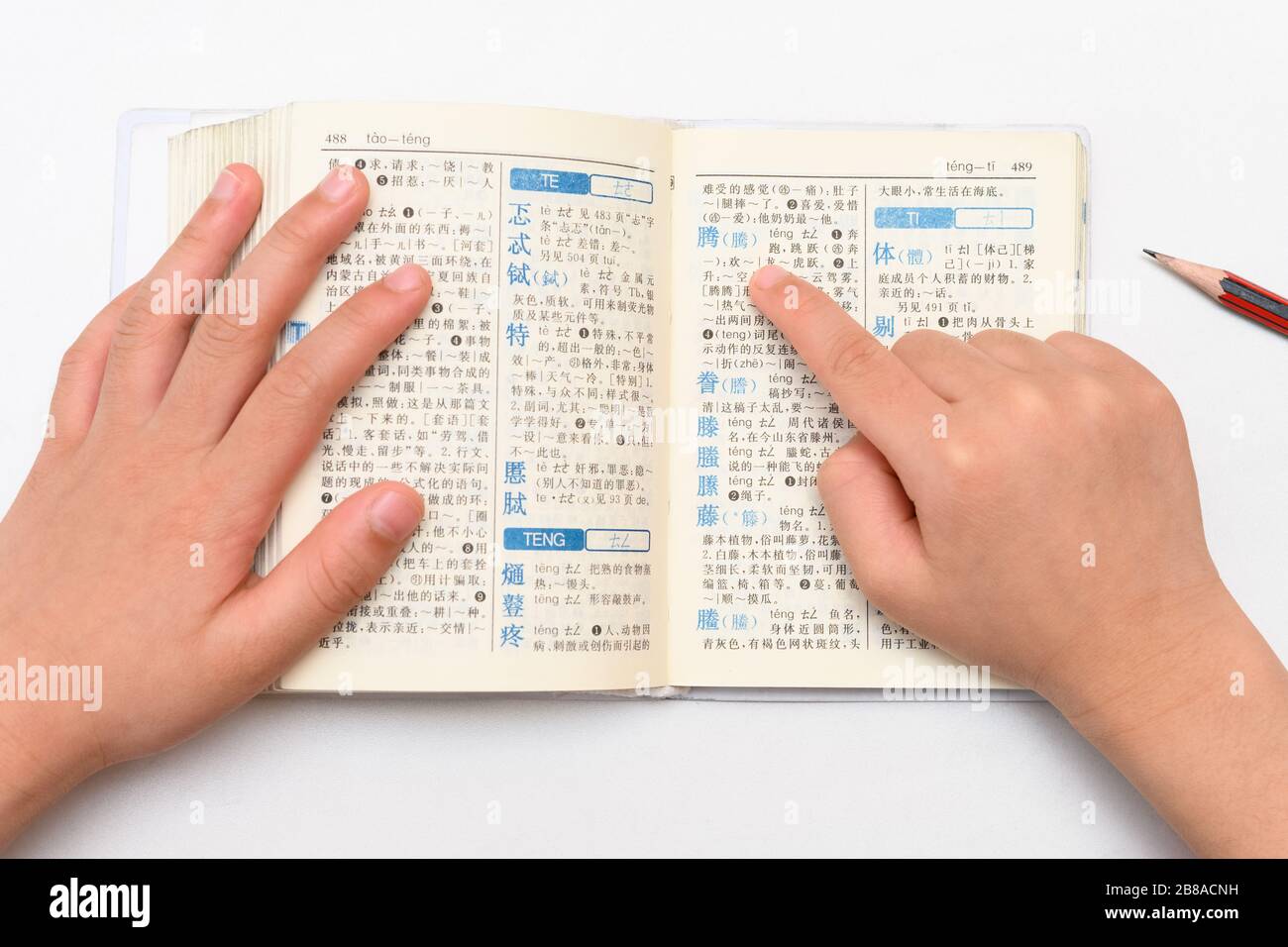 Boy with dictionary hi-res stock photography and images - Alamy