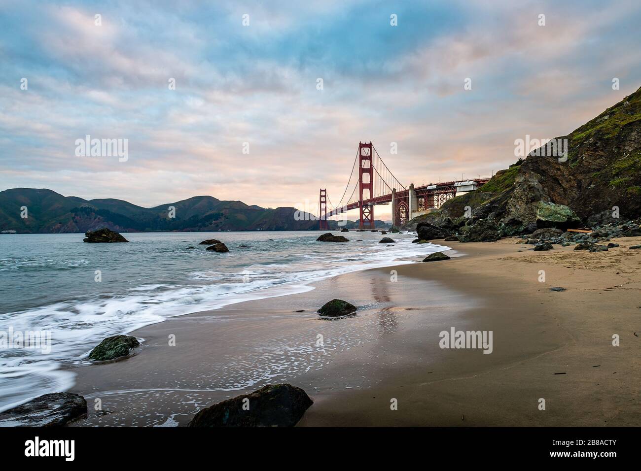 The Golden Gate Bridge and Marshall's Beach at Dawn Stock Photo - Alamy