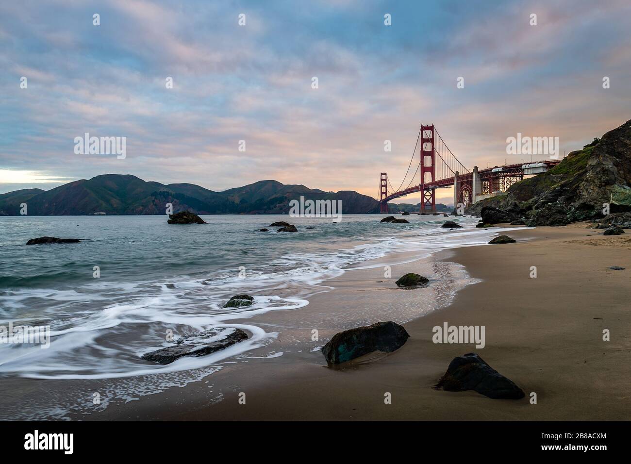 The Golden Gate Bridge and Marshall's Beach at Dawn Stock Photo - Alamy