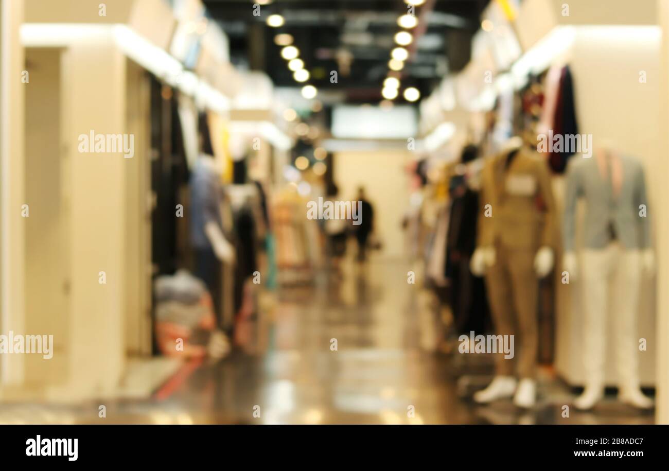 Blurred picture of Men Suit Shop Clothing store fashion shop inside ...